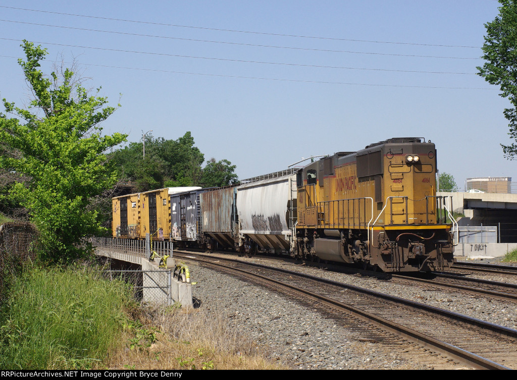 UP 4151 operating long hood forward as it crosses I 20